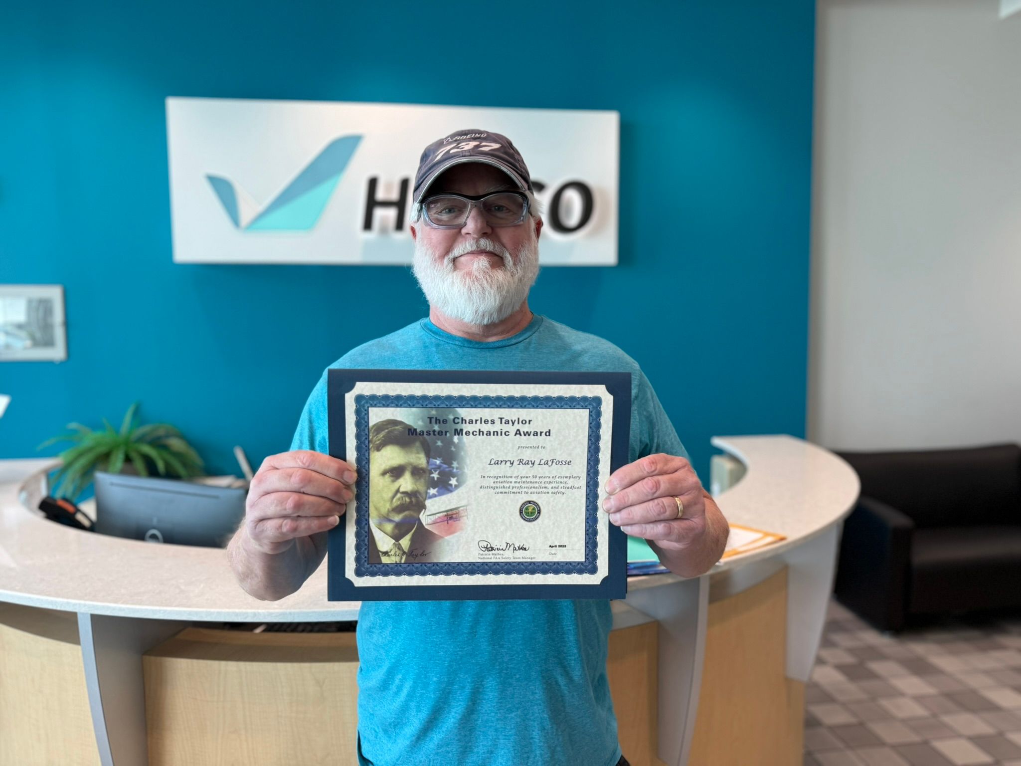 Larry LaFosse honoured with Charles Taylor Master Mechanic Award